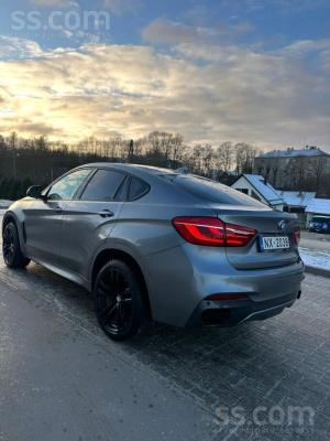 Grey BMW X6 2016 in Riga, with an engine capacity of 3.00 L and mileage of 302 thousand km for 20000 €, photo 10 on AUTOMOTO.COM.LV