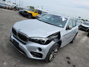 Grey BMW X6 2016 in Taurage, with an engine capacity of 2.98 L and mileage of 133 thousand km for 14250 €, photo 27 on AUTOMOTO.COM.LV