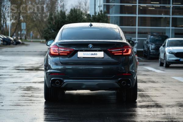 Grey BMW X6 2017 in Riga, with an engine capacity of 3.00 L and mileage of 198 thousand km for 22990 €, photo 5 on AUTOMOTO.COM.LV