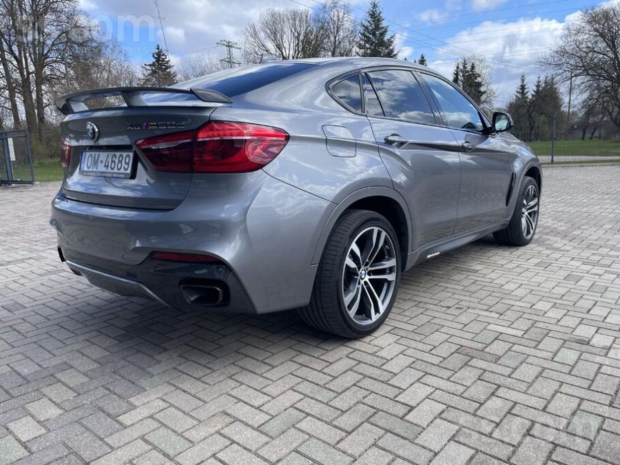 Grey BMW X6 2017 in Ogre, with an engine capacity of 3.00 L and mileage of 150 thousand km for 32470 €, photo 5 on AUTOMOTO.COM.LV