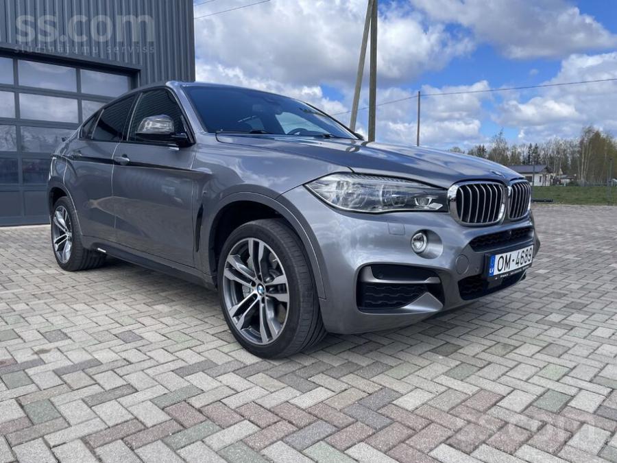 Grey BMW X6 2017 in Ogre, with an engine capacity of 3.00 L and mileage of 150 thousand km for 32470 €, photo 7 on AUTOMOTO.COM.LV