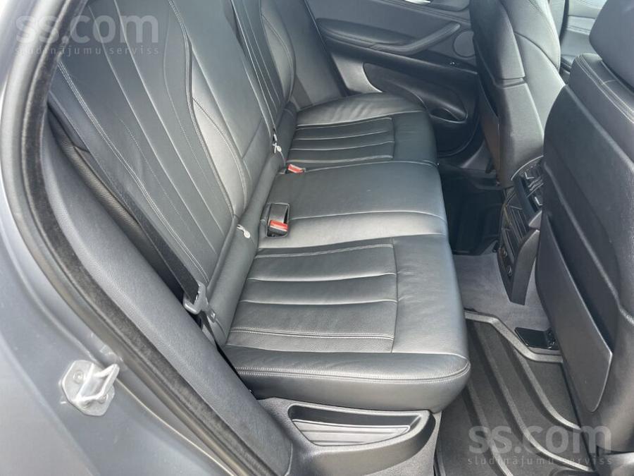 Grey BMW X6 2017 in Ogre, with an engine capacity of 3.00 L and mileage of 150 thousand km for 32470 €, photo 9 on AUTOMOTO.COM.LV