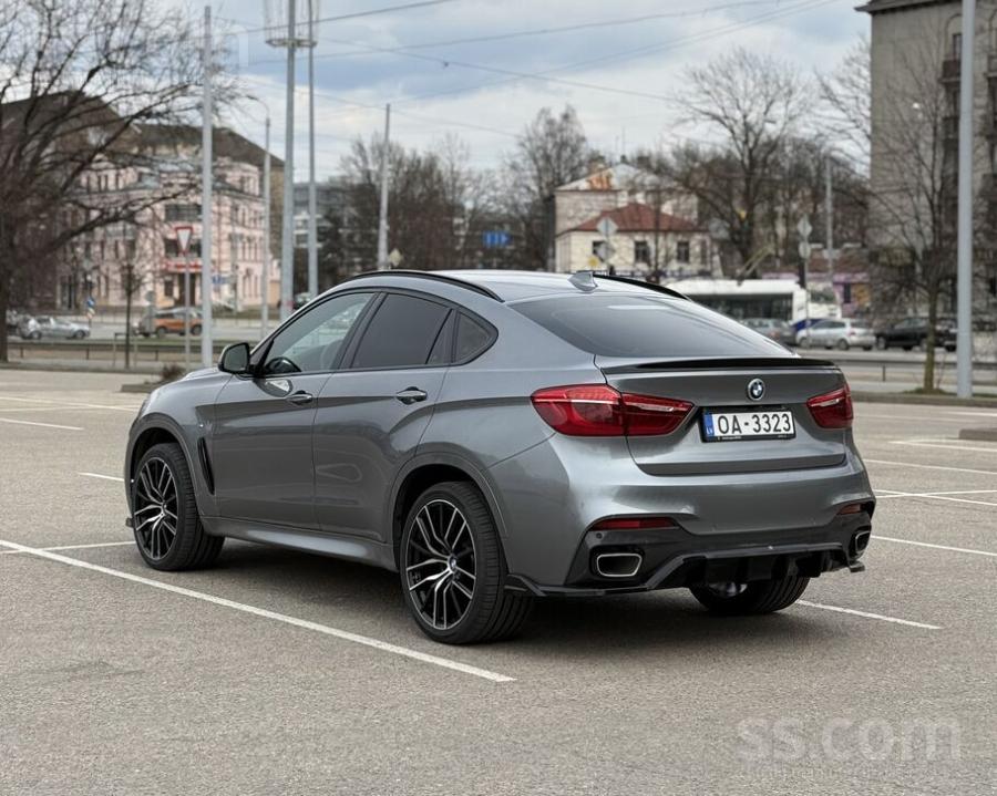 Grey BMW X6 2017 in Riga, with an engine capacity of 3.00 L and mileage of 297 thousand km for 21900 €, photo 5 on AUTOMOTO.COM.LV