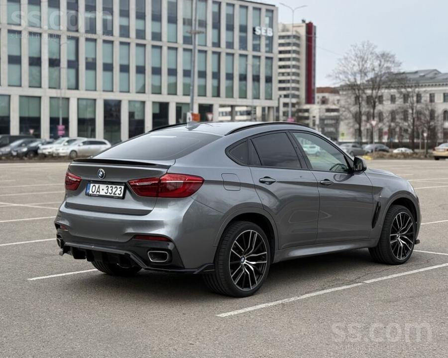 Grey BMW X6 2017 in Riga, with an engine capacity of 3.00 L and mileage of 297 thousand km for 21900 €, photo 7 on AUTOMOTO.COM.LV