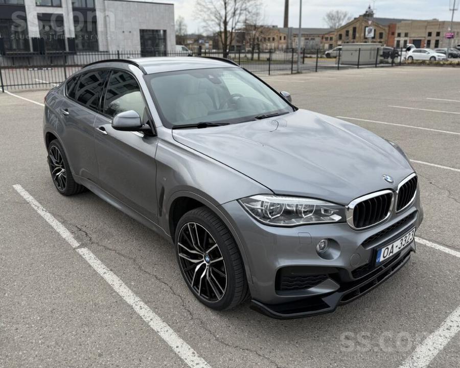 Grey BMW X6 2017 in Riga, with an engine capacity of 3.00 L and mileage of 297 thousand km for 21900 €, photo 8 on AUTOMOTO.COM.LV