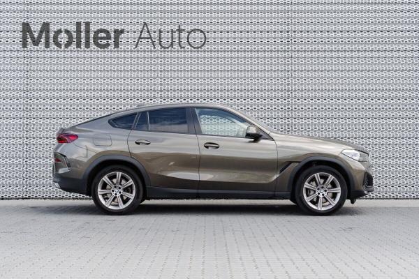 Grey BMW X6 2021 in Marupe, with an engine capacity of 3.00 L and mileage of 104 thousand km for 56050 €, photo 5 on AUTOMOTO.COM.LV