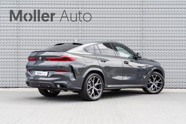 Grey BMW X6 2022 in Marupe, with an engine capacity of 3.00 L and mileage of 103 thousand km for 61850 €, photo 4 on AUTOMOTO.COM.LV