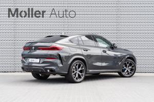 Grey BMW X6 2022 in Marupe, with an engine capacity of 3.00 L and mileage of 103 thousand km for 61850 €, photo 5 on AUTOMOTO.COM.LV