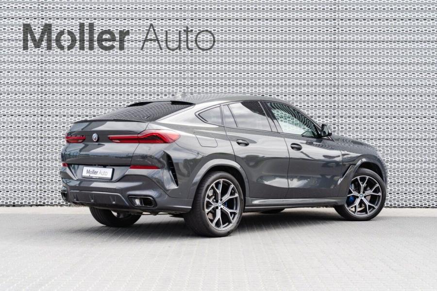 Grey BMW X6 2022 in Marupe, with an engine capacity of 3.00 L and mileage of 103 thousand km for 61850 €, photo 5 on AUTOMOTO.COM.LV