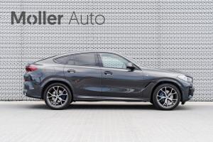 Grey BMW X6 2022 in Marupe, with an engine capacity of 3.00 L and mileage of 103 thousand km for 61850 €, photo 6 on AUTOMOTO.COM.LV
