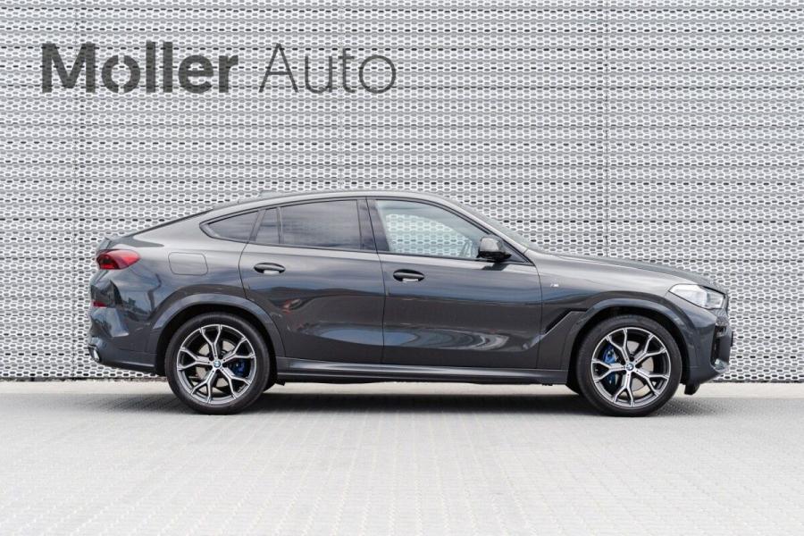 Grey BMW X6 2022 in Marupe, with an engine capacity of 3.00 L and mileage of 103 thousand km for 61850 €, photo 6 on AUTOMOTO.COM.LV