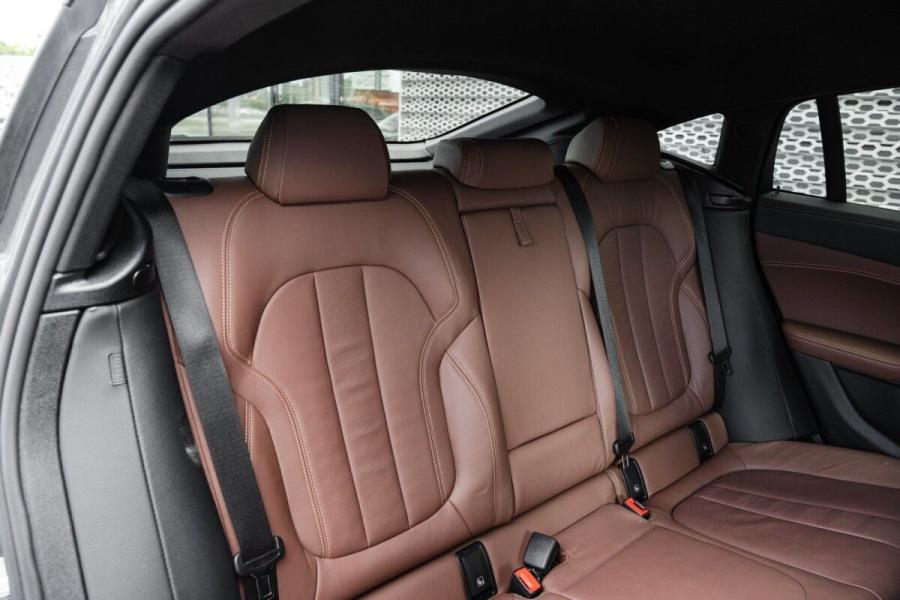 Grey BMW X6 2022 in Marupe, with an engine capacity of 3.00 L and mileage of 103 thousand km for 61850 €, photo 28 on AUTOMOTO.COM.LV