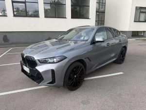 Grey BMW X6 2023 in Kaunas, with an engine capacity of 3.00 L and mileage of 115 thousand km for 59999 €, photo  on AUTOMOTO.COM.LV