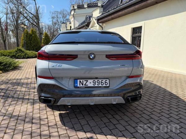 Grey BMW X6 2024 in Rezekne, with an engine capacity of 3.00 L and mileage of 71 thousand km for 71500 €, photo 5 on AUTOMOTO.COM.LV