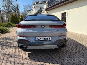 Grey BMW X6 2024 in Rezekne, with an engine capacity of 3.00 L and mileage of 71 thousand km for 71500 €, photo 6 on AUTOMOTO.COM.LV