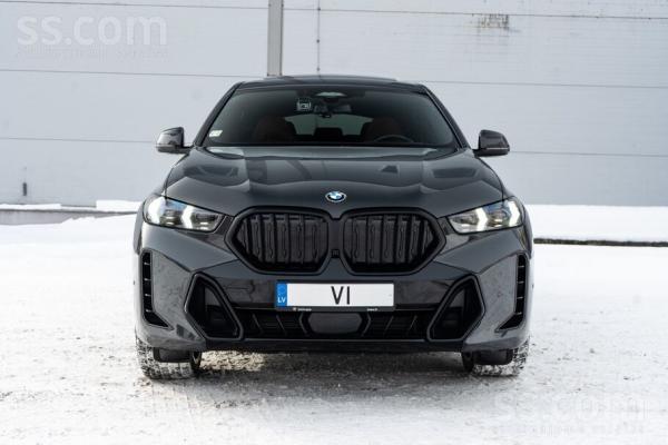 Grey BMW X6 2024 in Riga, with an engine capacity of 3.00 L and mileage of 53 thousand km for 96300 €, photo 1 on AUTOMOTO.COM.LV
