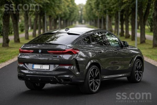 Grey BMW X6 2024 in Riga, with an engine capacity of 3.00 L and mileage of 53 thousand km for 91300 €, photo 6 on AUTOMOTO.COM.LV