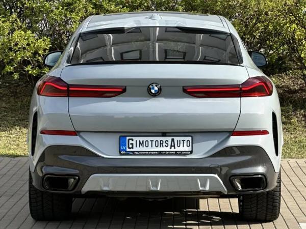 Grey BMW X6 2024 in Riga, with an engine capacity of 3.00 L and mileage of 26 thousand km for 89900 €, photo 7 on AUTOMOTO.COM.LV