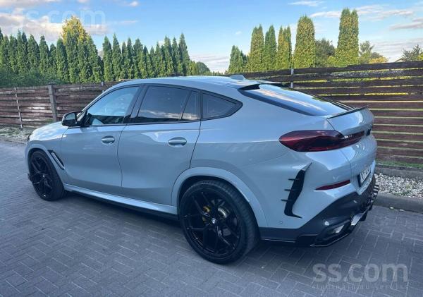 Grey BMW X6 2024 in Riga, with an engine capacity of 3.00 L and mileage of 40 thousand km for 80000 €, photo 5 on AUTOMOTO.COM.LV