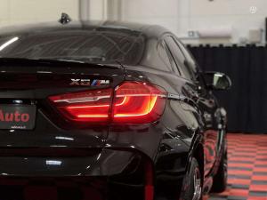 Black BMW X6 M 2015 in Vilnius, with an engine capacity of 4.40 L and mileage of 112 thousand km for 35800 €, photo 10 on AUTOMOTO.COM.LV
