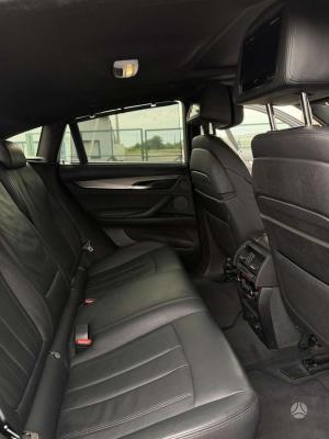 Melns BMW X6 M 2015 Panevēža, ar dzinēja tilpumu 2.99 L un nobraukumu 84 tūkst. km par 23000 €, foto 13 vietnē AUTOMOTO.COM.LV