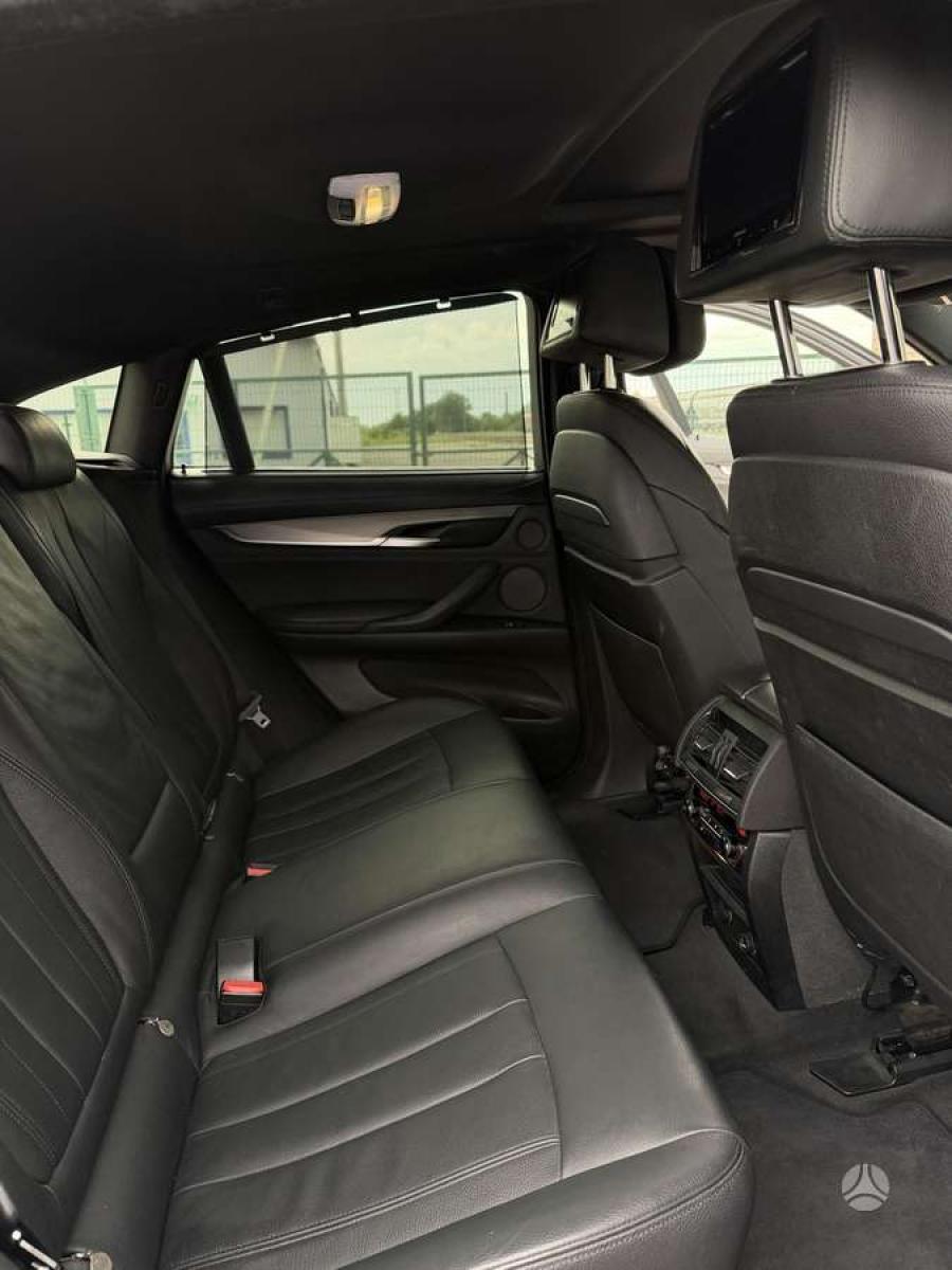 Melns BMW X6 M 2015 Panevēža, ar dzinēja tilpumu 2.99 L un nobraukumu 84 tūkst. km par 23000 €, foto 13 vietnē AUTOMOTO.COM.LV