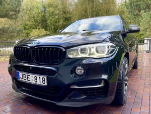 Black BMW X6 M 2015 in Siauliai, with an engine capacity of 2.99 L and mileage of 230 thousand km for 25800 €, photo  on AUTOMOTO.COM.LV