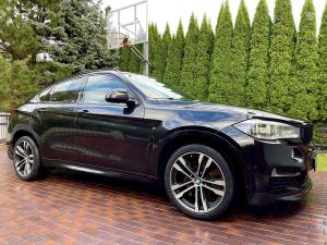Black BMW X6 M 2015 in Siauliai, with an engine capacity of 2.99 L and mileage of 230 thousand km for 25800 €, photo 8 on AUTOMOTO.COM.LV