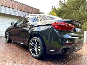 Black BMW X6 M 2015 in Siauliai, with an engine capacity of 2.99 L and mileage of 230 thousand km for 25800 €, photo 11 on AUTOMOTO.COM.LV