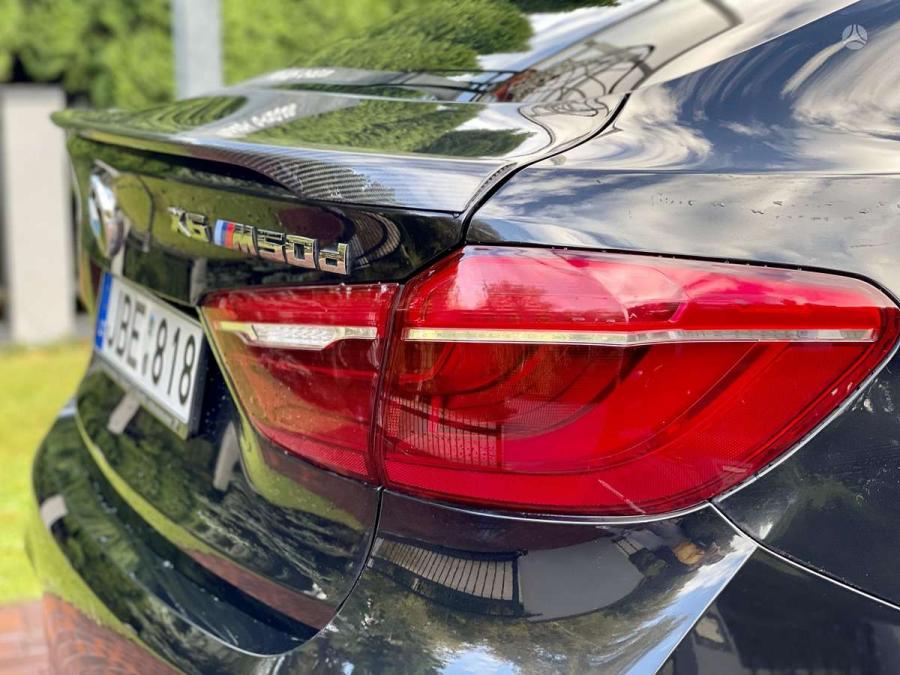 Black BMW X6 M 2015 in Siauliai, with an engine capacity of 2.99 L and mileage of 230 thousand km for 25800 €, photo 12 on AUTOMOTO.COM.LV
