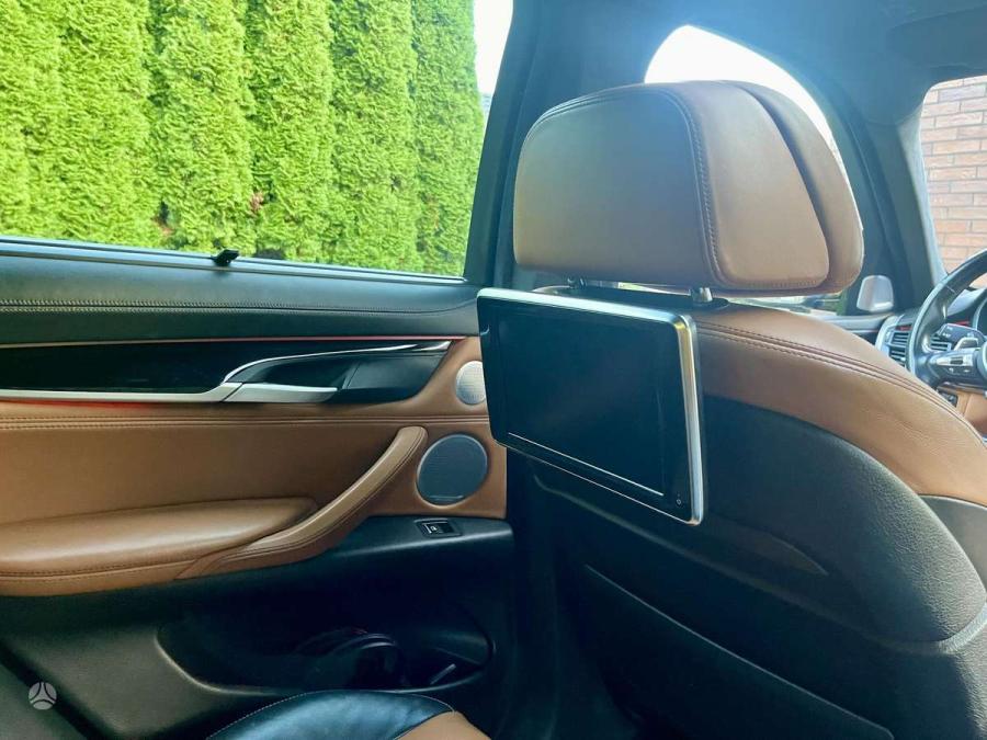 Black BMW X6 M 2015 in Siauliai, with an engine capacity of 2.99 L and mileage of 230 thousand km for 25800 €, photo 32 on AUTOMOTO.COM.LV