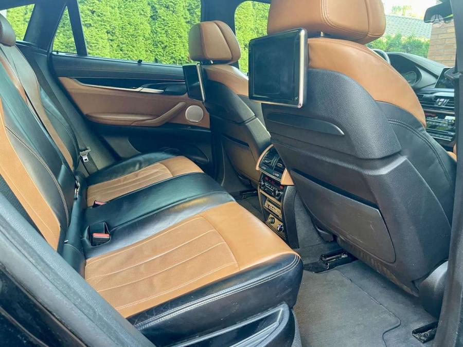 Black BMW X6 M 2015 in Siauliai, with an engine capacity of 2.99 L and mileage of 230 thousand km for 25800 €, photo 33 on AUTOMOTO.COM.LV