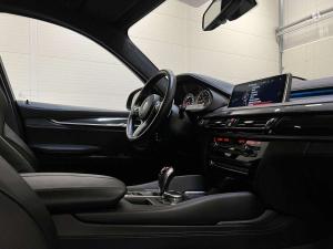 Black BMW X6 M 2015 in Vilnius, with an engine capacity of 4.40 L and mileage of 112 thousand km for 29990 €, photo 21 on AUTOMOTO.COM.LV