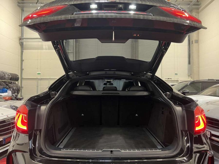 Black BMW X6 M 2015 in Vilnius, with an engine capacity of 4.40 L and mileage of 112 thousand km for 29990 €, photo 39 on AUTOMOTO.COM.LV