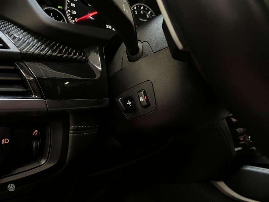 Black BMW X6 M 2015 in Vilnius, with an engine capacity of 4.40 L and mileage of 112 thousand km for 26470 €, photo 19 on AUTOMOTO.COM.LV