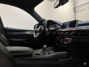 Black BMW X6 M 2015 in Vilnius, with an engine capacity of 4.40 L and mileage of 112 thousand km for 26470 €, photo 21 on AUTOMOTO.COM.LV
