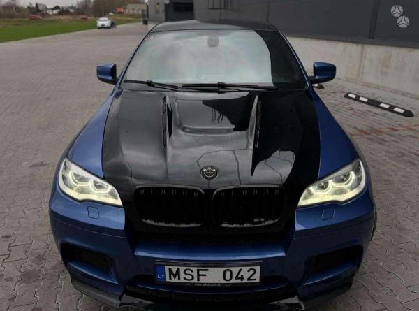 Blue BMW X6 M 2013 in Siauliai, with an engine capacity of 4.40 L and mileage of 100 thousand km for 24400 €, photo 5 on AUTOMOTO.COM.LV