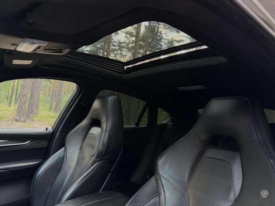 Grey BMW X6 M 2015 in Riga, with an engine capacity of 4.40 L and mileage of 180 thousand km for 28000 €, photo 20 on AUTOMOTO.COM.LV
