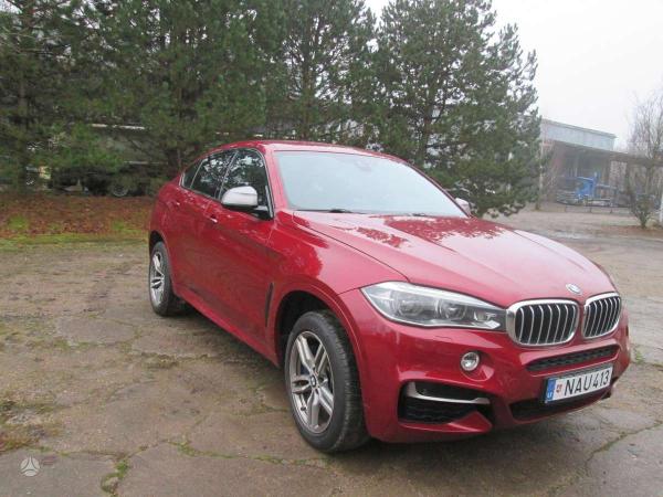 Red BMW X6 M 2015 in Taurage, with an engine capacity of 2.99 L and mileage of 240 thousand km for 29500 €, photo 1 on AUTOMOTO.COM.LV