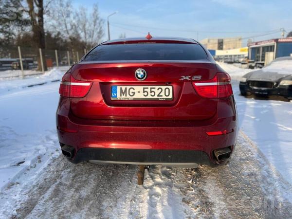 Red BMW X6 2008 in Riga, with an engine capacity of 3.00 L and mileage of 325 thousand km for 7990 €, photo 6 on AUTOMOTO.COM.LV
