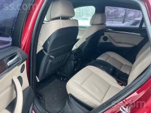 Red BMW X6 2008 in Riga, with an engine capacity of 3.00 L and mileage of 325 thousand km for 7990 €, photo 8 on AUTOMOTO.COM.LV