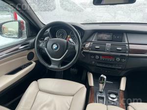Red BMW X6 2008 in Riga, with an engine capacity of 3.00 L and mileage of 325 thousand km for 7990 €, photo 12 on AUTOMOTO.COM.LV