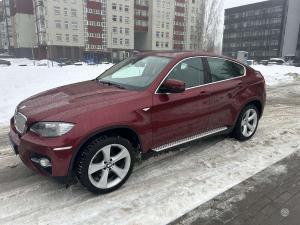 Red BMW X6 2009 in Vilnius, with an engine capacity of 2.99 L and mileage of 278 thousand km for 10300 €, photo  on AUTOMOTO.COM.LV