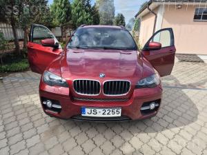 Red BMW X6 2009 in Daugavpils, with an engine capacity of 3.00 L and mileage of 315 thousand km for 11200 €, photo  on AUTOMOTO.COM.LV