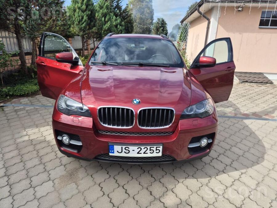 Red BMW X6 2009 in Daugavpils, with an engine capacity of 3.00 L and mileage of 315 thousand km for 11200 €, photo 1 on AUTOMOTO.COM.LV