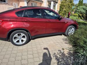 Red BMW X6 2009 in Daugavpils, with an engine capacity of 3.00 L and mileage of 315 thousand km for 11200 €, photo 4 on AUTOMOTO.COM.LV