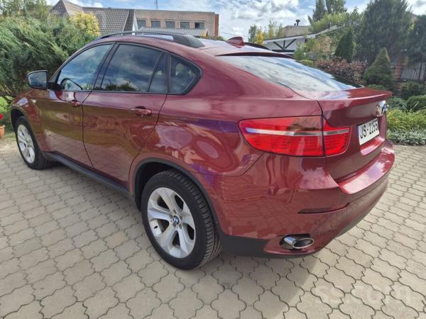 Red BMW X6 2009 in Daugavpils, with an engine capacity of 3.00 L and mileage of 315 thousand km for 11200 €, photo 5 on AUTOMOTO.COM.LV