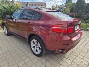 Red BMW X6 2009 in Daugavpils, with an engine capacity of 3.00 L and mileage of 315 thousand km for 11200 €, photo 5 on AUTOMOTO.COM.LV