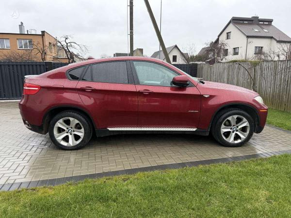 Red BMW X6 2010 in Klaipeda, with an engine capacity of 2.98 L and mileage of 210 thousand km for 9500 €, photo 1 on AUTOMOTO.COM.LV