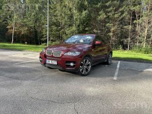 Sarkans BMW X6 2011 Rīga, ar dzinēja tilpumu 4.40 L un nobraukumu 217 tūkst. km par 14000 €, foto  vietnē AUTOMOTO.COM.LV